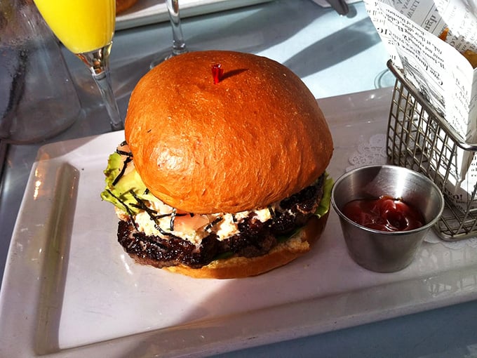 This isn't just a burger—it's architecture. A perfectly stacked masterpiece that makes you wonder if it's too beautiful to eat. (It's not.)