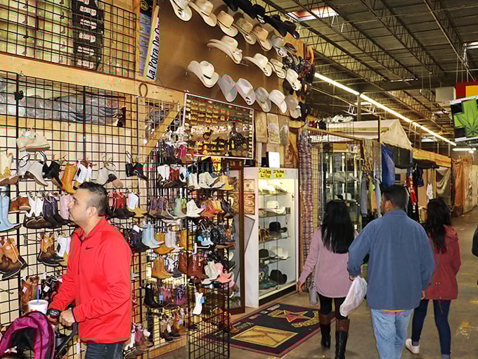The cowboy hat section—where urban cowboys and authentic ranchers stand shoulder to shoulder, united in their quest for the perfect brim.