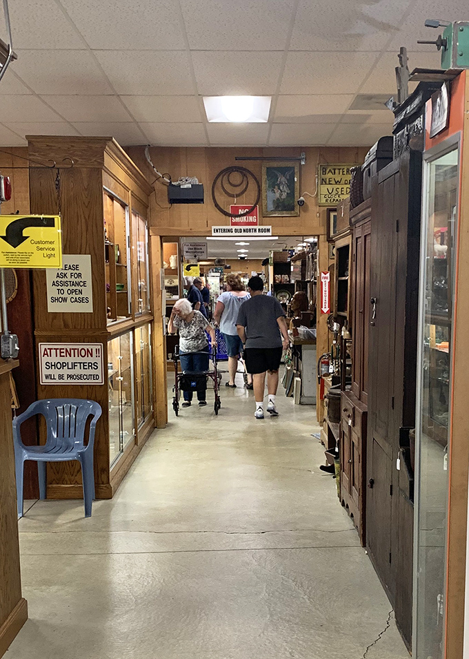 The thrill of the hunt brings treasure seekers of all ages, navigating narrow passageways between wooden wardrobes and glass display cases.