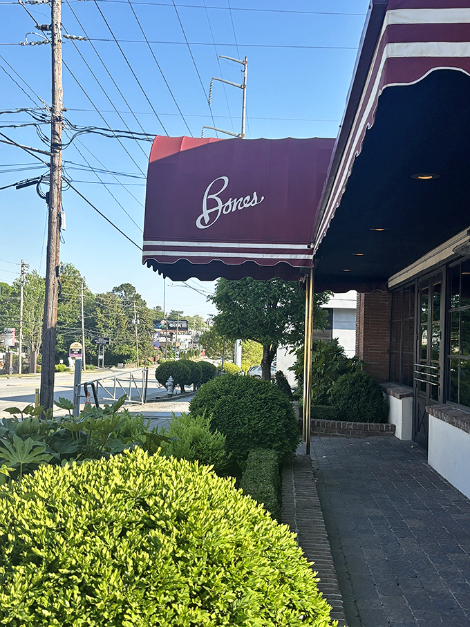 That burgundy awning isn't just for show—it's the red carpet for your taste buds' grand entrance.