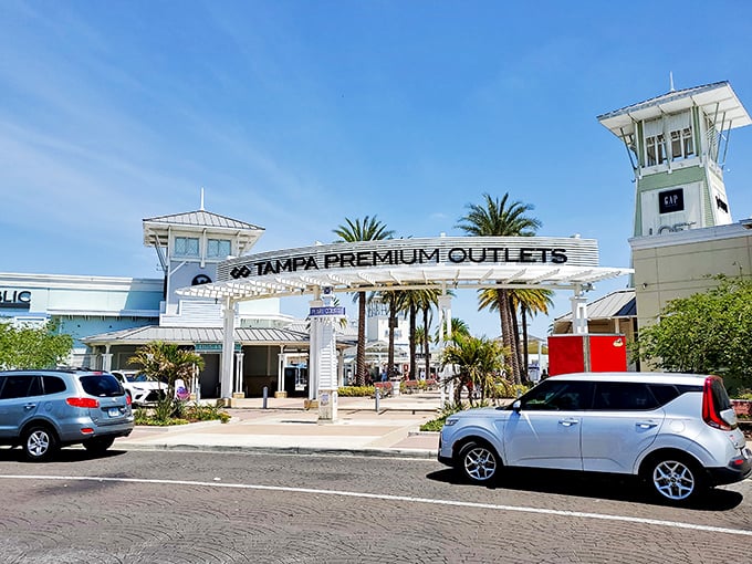 Tampa Premium Outlets gleams under the Florida sun, looking more like a resort than a place to score 70% off last season's favorites.