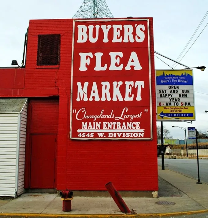 That bold red building isn't playing hard to get—it's practically shouting "Bargains inside!" to passing shoppers.