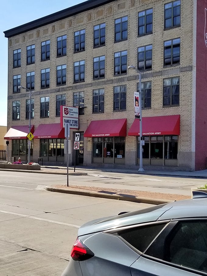 The Salvation Army's brick storefront stands tall, a cathedral of cast-offs transformed into treasures for the patient hunter.