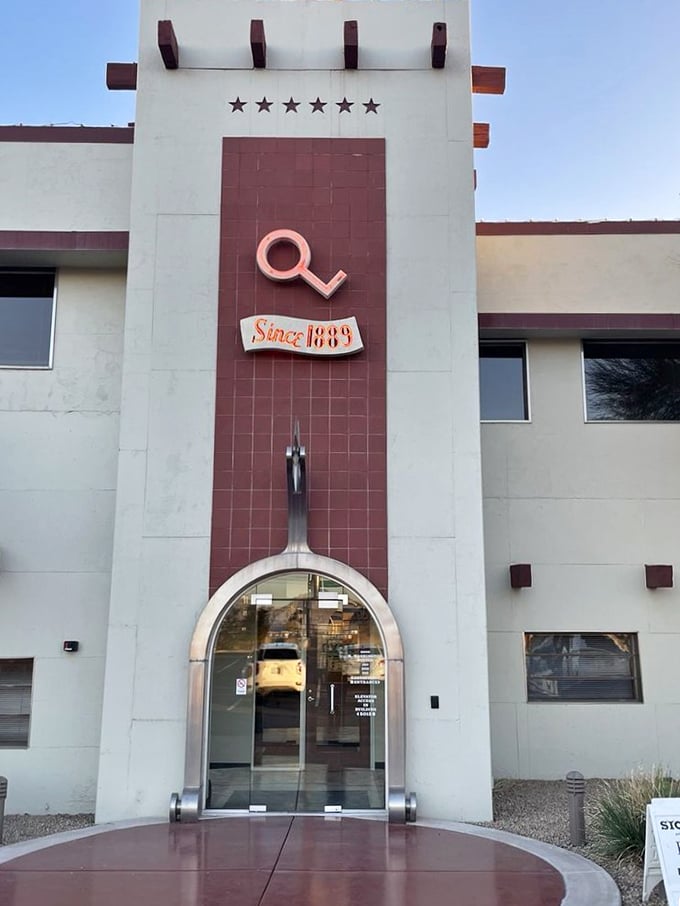 The Stockyards' iconic sign isn't just announcing a restaurant—it's a beacon for beef lovers that's been guiding hungry Arizonans since 1947.