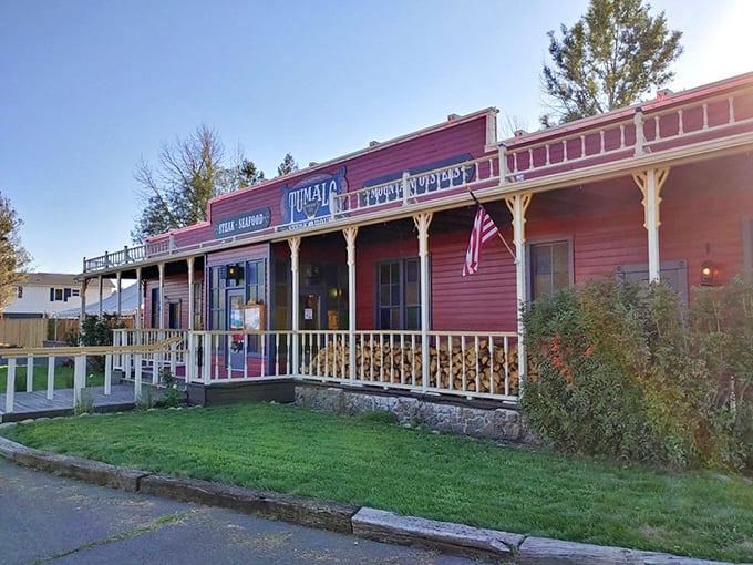 Tumalo Feed Co.'s classic Western façade stands as a red reminder that sometimes the best steaks come with a side of nostalgia.