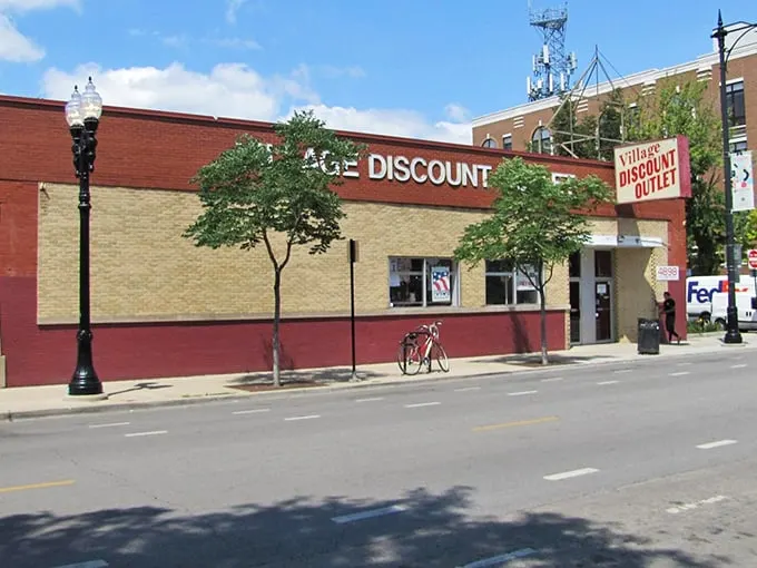 Village Discount Outlet's unassuming exterior hides a labyrinth of potential discoveries within its brick walls.