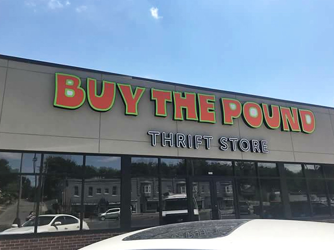 The vibrant green and red signage of Buy The Pound practically shouts "bargains inside!" to passing treasure hunters.