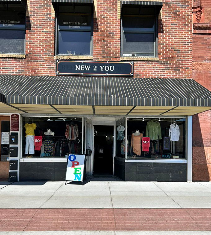 Window displays showcase carefully selected clothing treasures. It's like window shopping where you can actually afford everything!