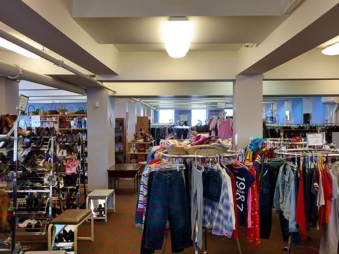 Inside Outfitters, racks of carefully organized clothing await their second chance at making a fashion statement.