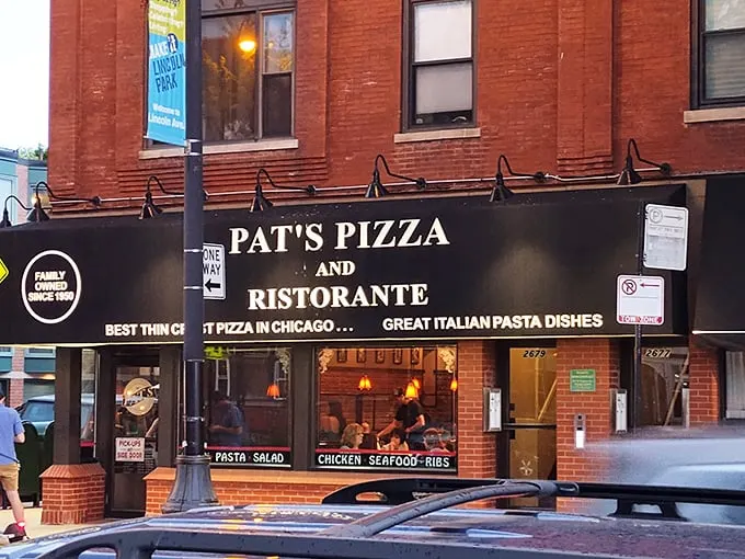 Through these windows, generations of Chicagoans have watched their thin-crust dreams come true at Pat's.