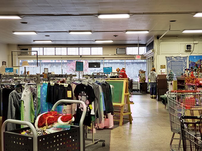 Penny Pincher's interior speaks the universal language of thrift – organized chaos with treasures hiding in plain sight.