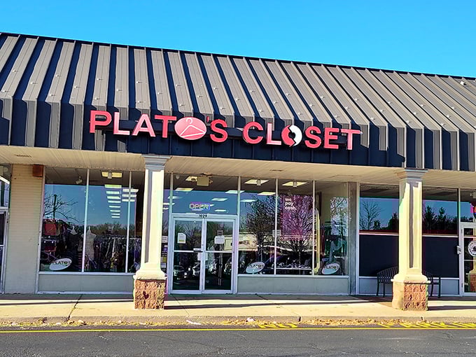 The black awning frames a window to style possibilities. Plato's Closet: where trendy meets thrifty in perfect harmony.