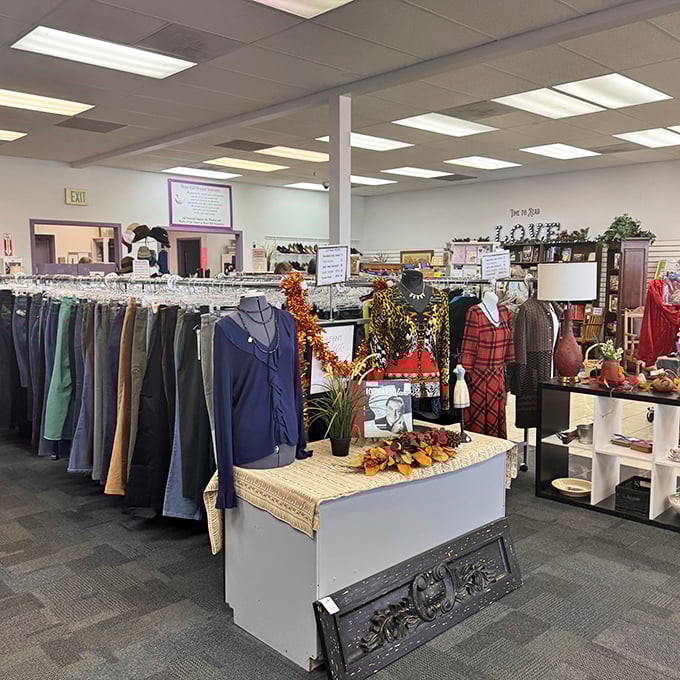 Fall displays and neatly arranged clothing racks show why Sisters isn't your average thrift store – it's a curated shopping experience.