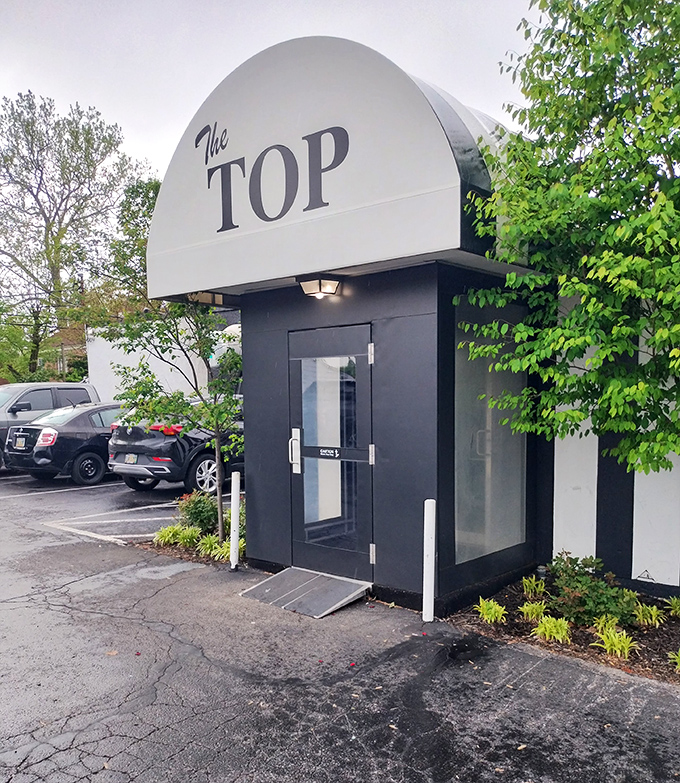 The Top Steak House: Elegant curves and classic styling—like finding a '57 Thunderbird that happens to serve perfect ribeyes and martinis.