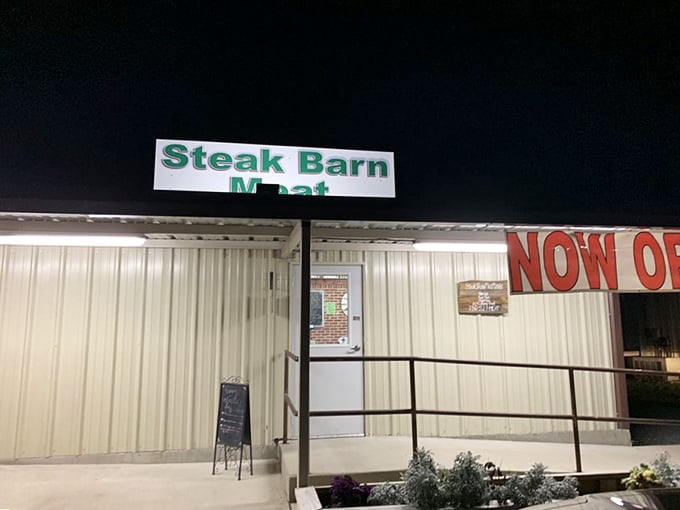 That red glow at night isn't just ambiance – it's the building blushing from all the compliments its steaks receive.
