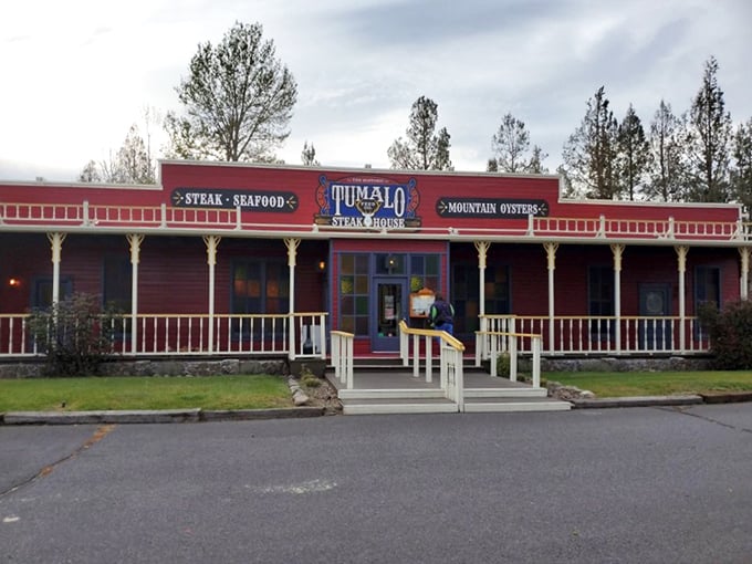 The bold red exterior of Tumalo Feed Co. practically shouts "We know our steaks!" – and they're not exaggerating.