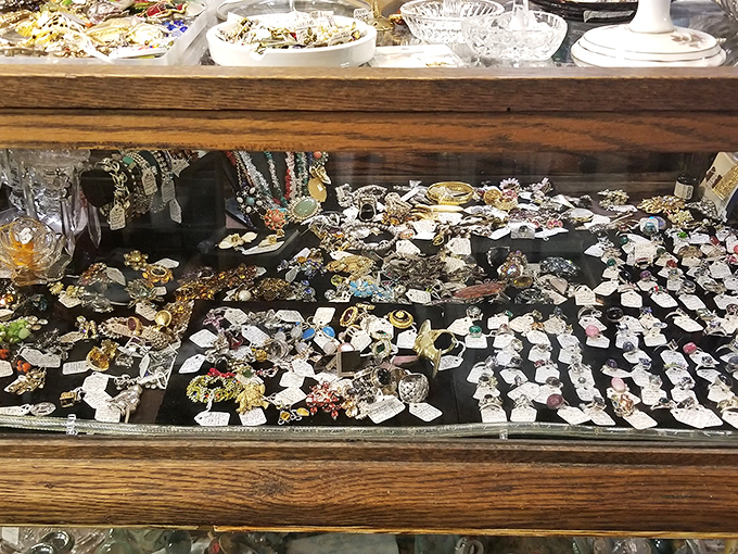 Jewelry cases that sparkle with possibilities. Each brooch and pendant carries whispers of cocktail parties, first dates, and the fashion statements of decades past.