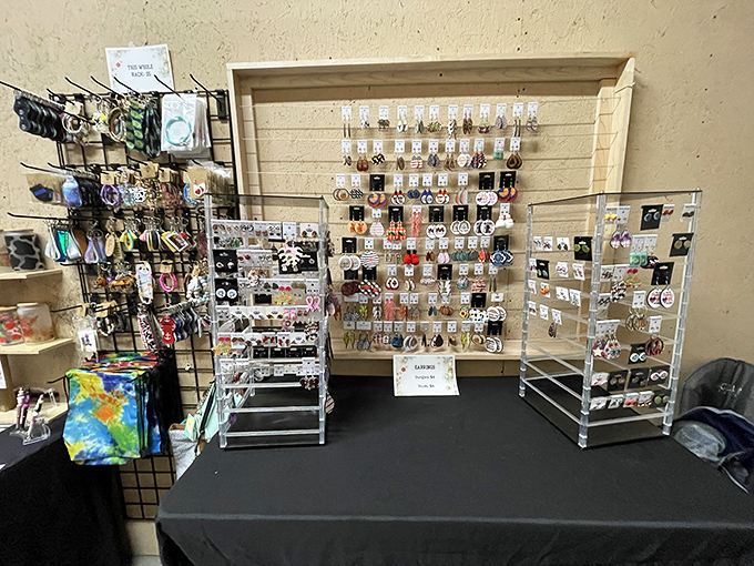 A jewelry lover's paradise where earrings, necklaces, and accessories hang like constellations of possibility. One person's craft becomes another's statement piece.