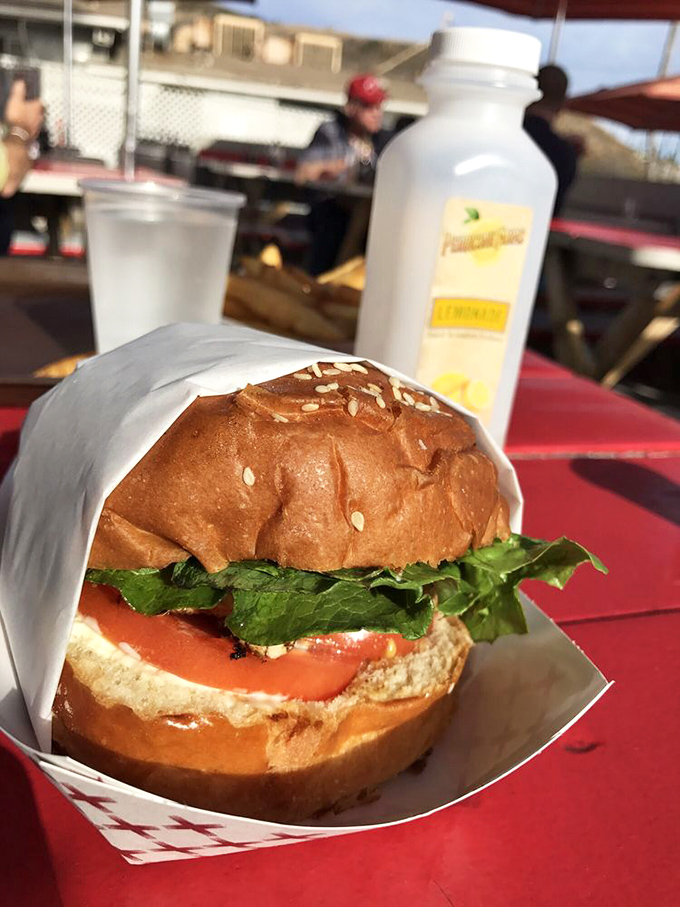 This isn't just a sandwich; it's a California dream on a bun—fresh ahi, crisp lettuce, and a hint of sauce that ties it all together.
