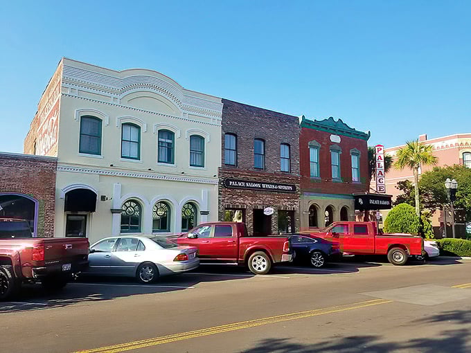 Victorian storefronts in a rainbow of colors house boutiques and cafés where shopping becomes an architectural appreciation tour.