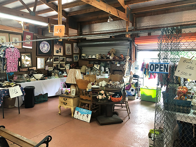 Booth 14 looks like your coolest grandma's living room exploded in the best possible way—organized chaos with vintage charm.