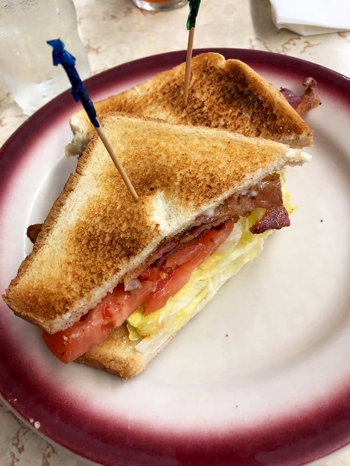 This isn't just a sandwich; it's a BLT that remembers when bacon was considered a breakfast food, not an artisanal religion.
