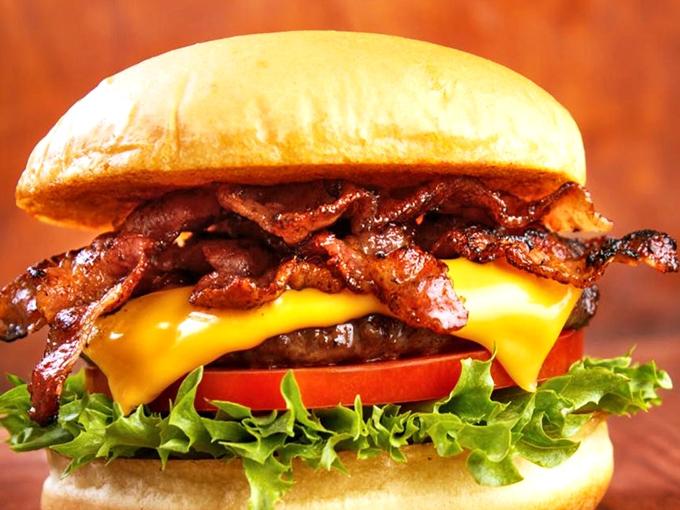 This isn't just a burger—it's a monument to the marriage of bacon, beef, and cheese that makes Monday mornings bearable again.