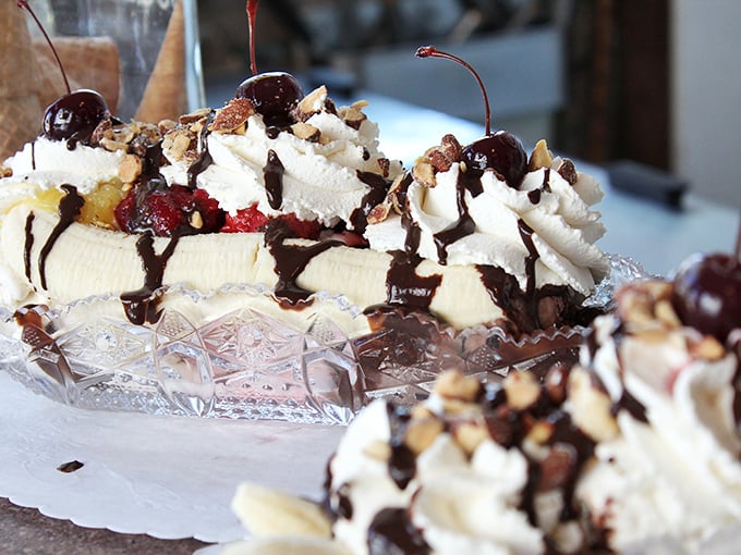 A banana split that would make your cardiologist wince and your inner child applaud. Worth every calorie and the extra treadmill time tomorrow.