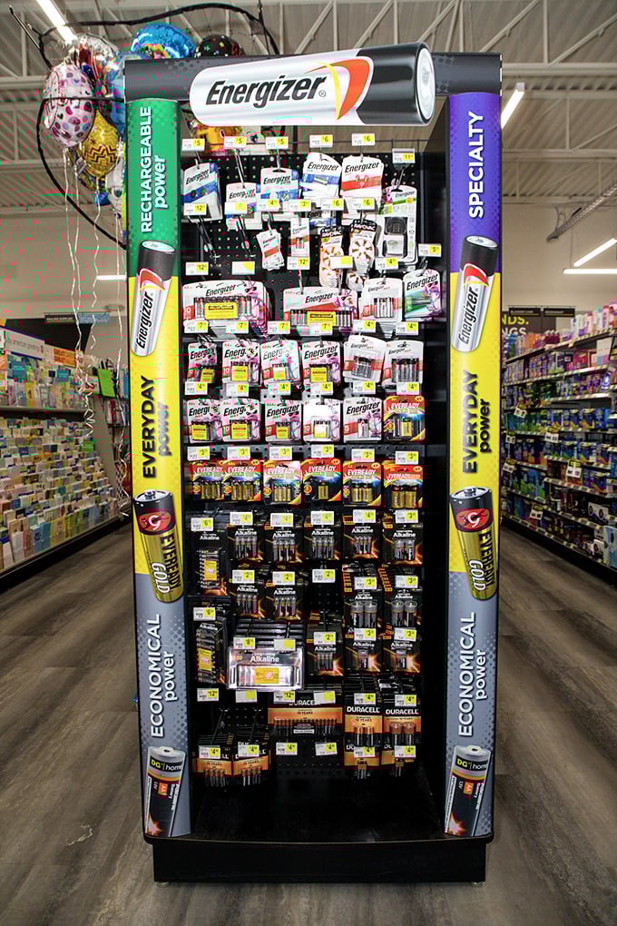 The wall of power! Like a museum exhibit dedicated to keeping your remote controls and smoke detectors living their best lives.