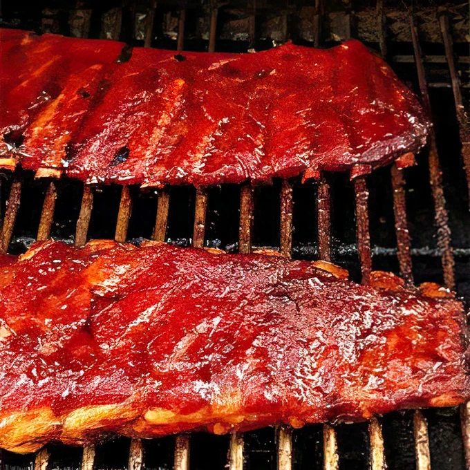 These ribs aren't just cooked – they're serenaded into tenderness. That glossy, caramelized sauce is the kind of thing food dreams are made of.