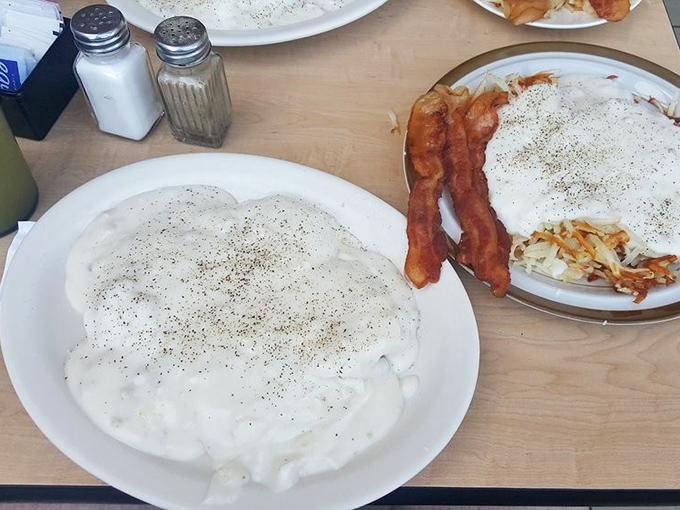 Biscuits and gravy: the breakfast that hugs you from the inside. That pepper-speckled blanket of gravy means business.