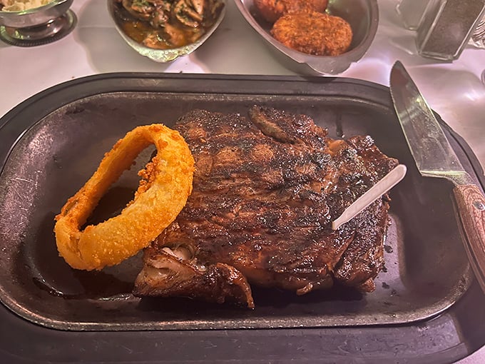 A bison ribeye that would make even Ted Turner weep with joy, complete with the steakhouse's signature onion ring halo.