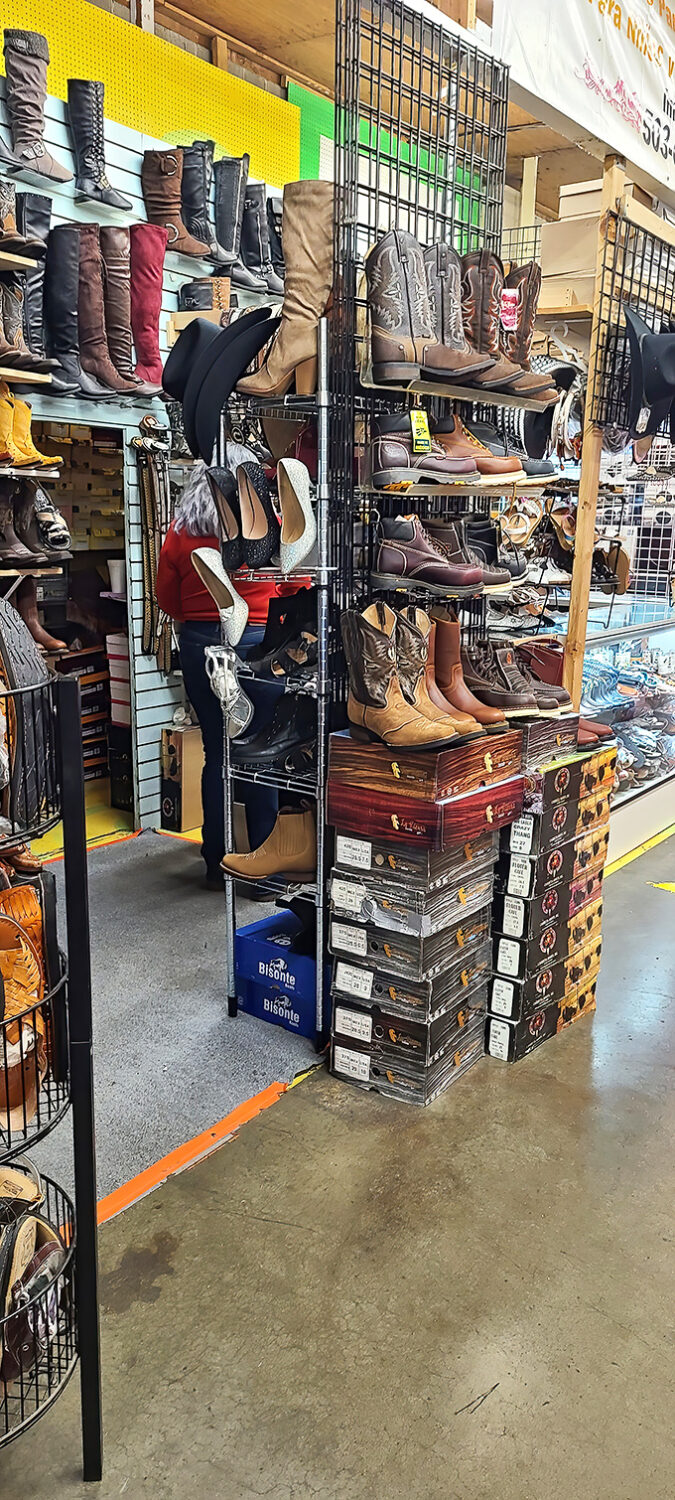Boot paradise for the indecisive shopper—whether you're channeling your inner cowboy or looking for something sleek and tall, this wall has your feet covered.