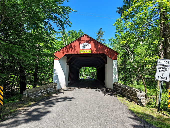 Spring brings a verdant explosion around the bridge. That 3-ton weight limit sign isn't kidding—they built things to last, not to carry your RV.
