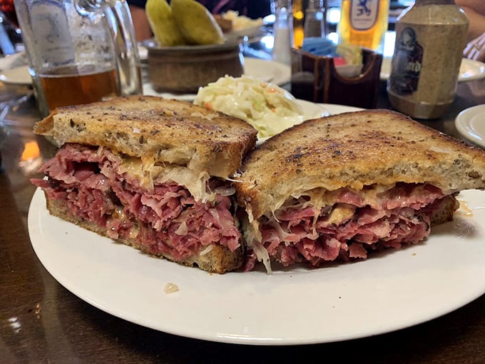Behold the Brooklyn Reuben in its natural habitat—perfectly grilled rye bread housing a neighborhood of flavors that get along surprisingly well.