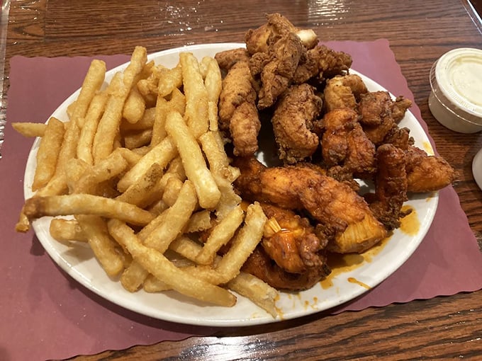 A mountain of crispy tenders alongside those legendary fries. Not so much a meal as a celebration on a plate.