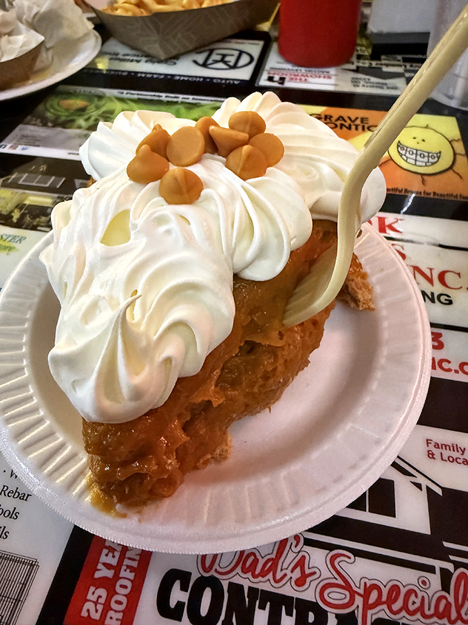 Butterscotch pie so golden and perfect it could make your grandmother simultaneously proud and jealous. That whipped cream mountain isn't just for show.