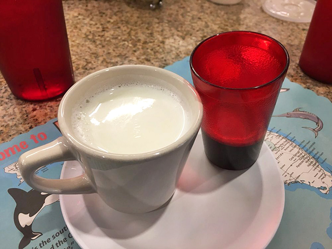 The café con leche arrives like liquid sunshine in a cup—strong enough to wake you up, smooth enough to make you smile.