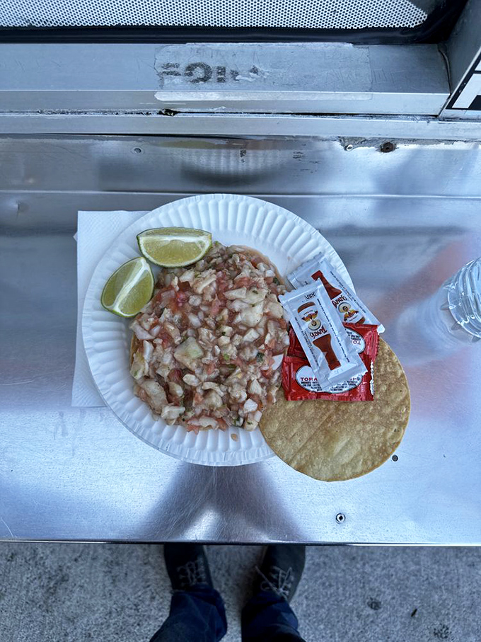 Ceviche and lime wedges—name a more perfect couple. This plate contains more refreshment than a swimming pool on a August afternoon.
