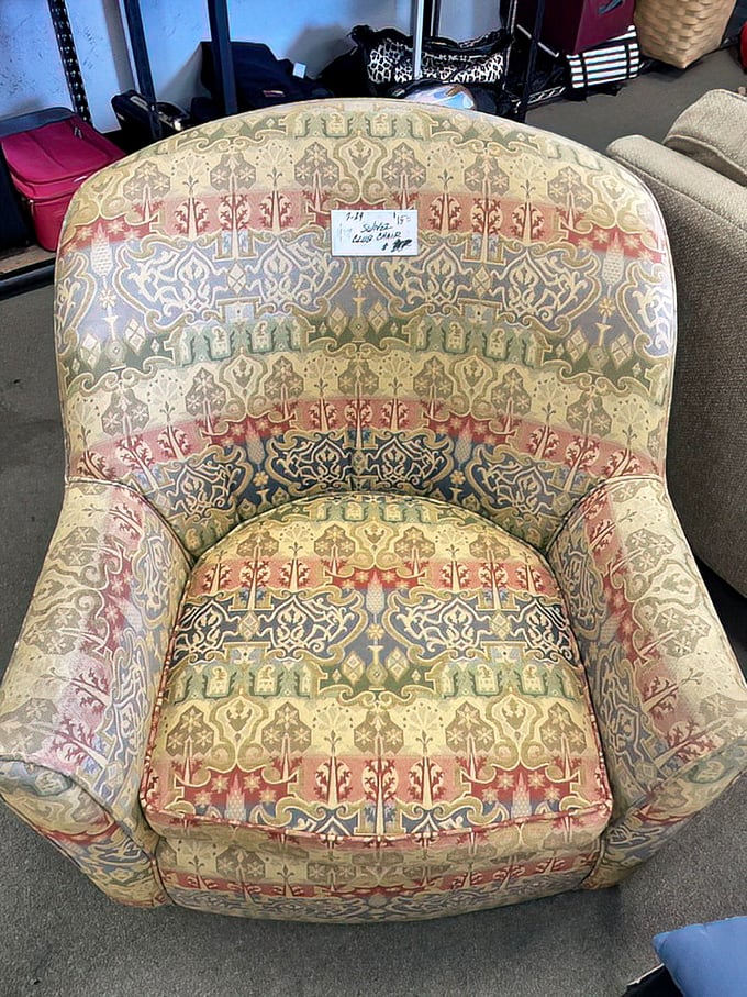 This tapestry chair has hosted countless conversations and is ready for its next chapter of comfort.