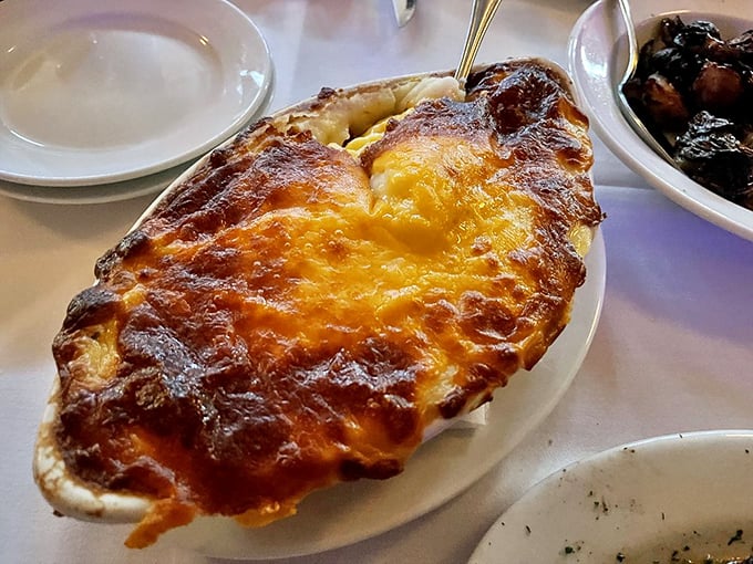 Golden, bubbling cheese transforms ordinary potatoes into something your grandmother would approve of—if your grandmother had trained at Le Cordon Bleu.
