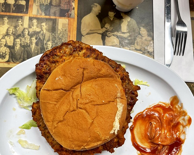This chicken fried steak isn't just dinner—it's therapy on a plate, with a bun hat and a side of nostalgia.