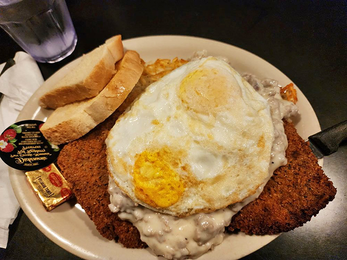 Country-fried steak smothered in gravy with a sunny-side-up egg on top—the breakfast of champions or the dinner of dreams? Why choose?