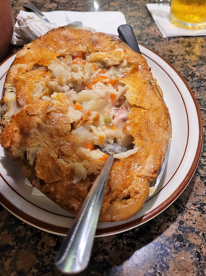 Not your mother's pot pie (unless your mother was an exceptional cook). This golden-domed beauty houses a savory treasure of comfort beneath its crust.