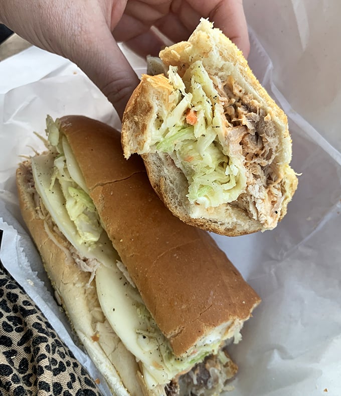 The chicken cutlet sandwich with its fresh vegetables proves that balance in life is possible – protein, greens, and carbs living together in delicious harmony.