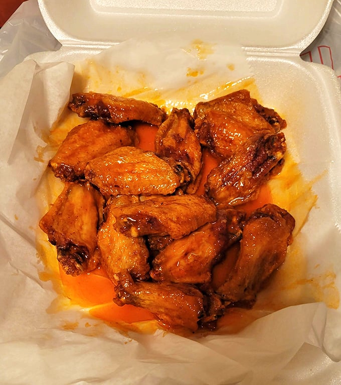 Wings that don't need fancy names or twenty sauce options—just honest heat, sticky-fingered satisfaction, and maybe an extra napkin or three.