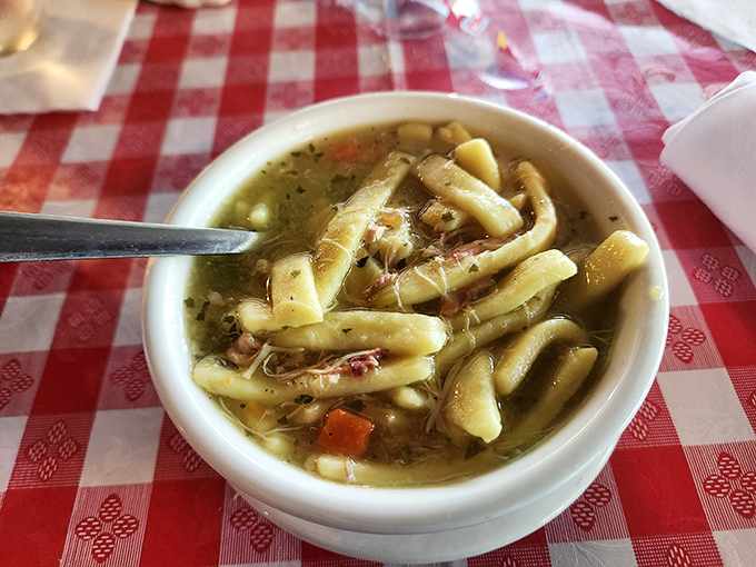 This chicken noodle soup isn't just comfort food—it's therapy in a bowl, with homemade noodles that put grandma on notice.