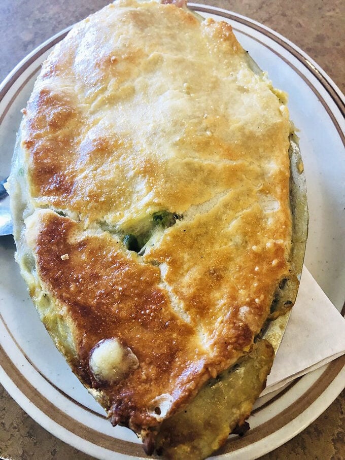 Golden, flaky crust hiding a steamy treasure of chicken and vegetables. Pot pie perfection that grandma would approve of.