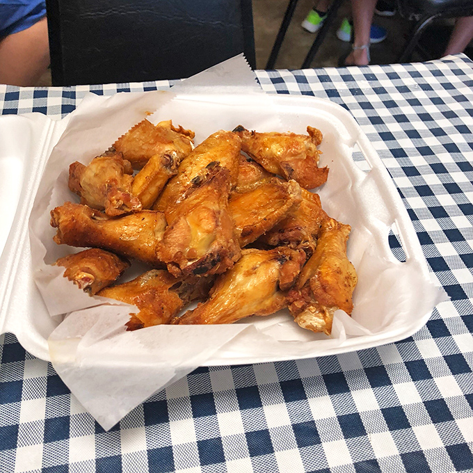 Golden wings that crackle with each bite, these aren't afterthoughts—they're main event contenders in their own right.