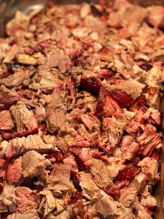 Barbecue so tender it surrendered long ago. This isn't just meat—it's a slow-cooked love letter to Southern patience.